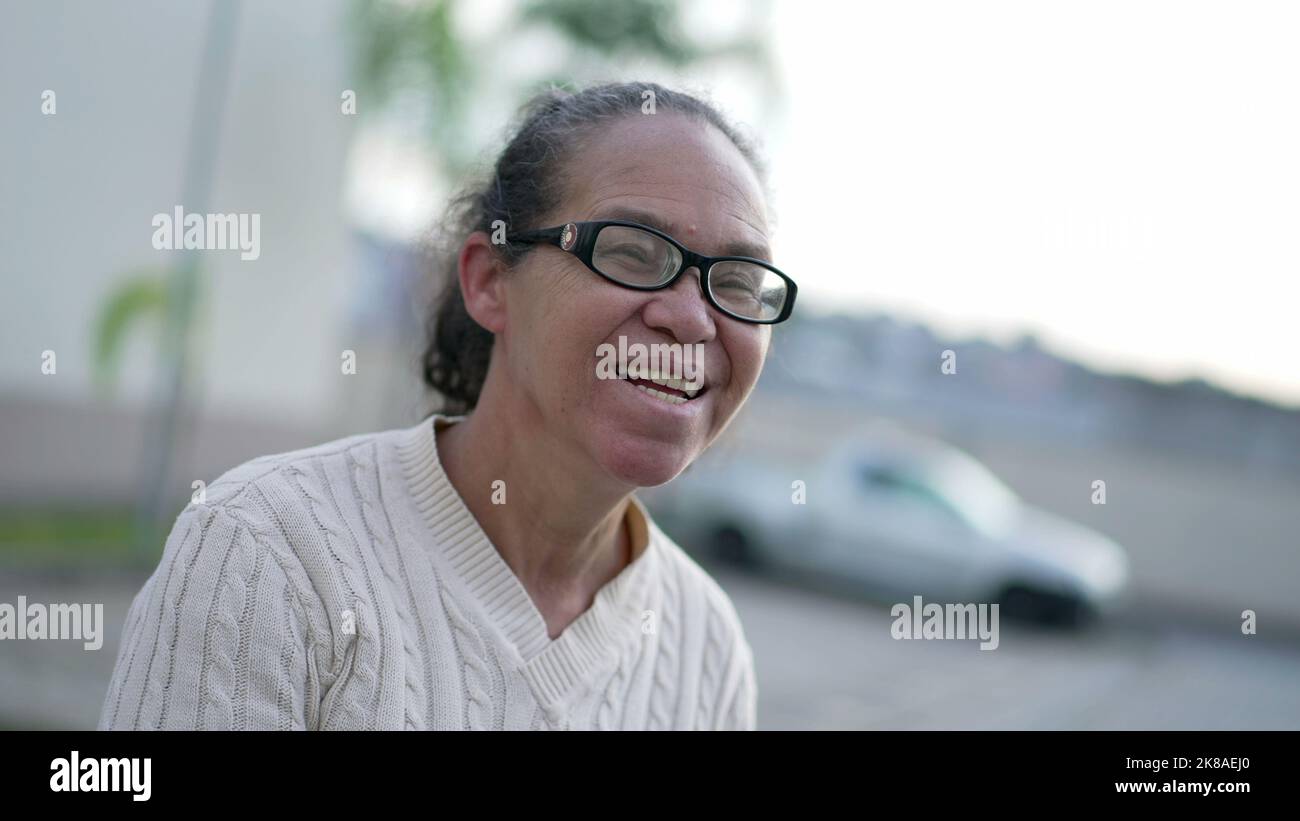 One happy senior woman laughing and smiling. South American hispanic ...