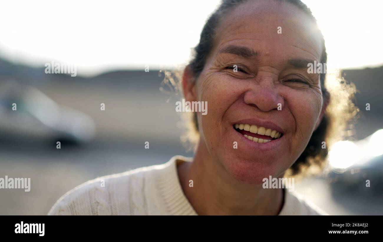 One happy Senior older woman laughing and smiling. Joyful South ...