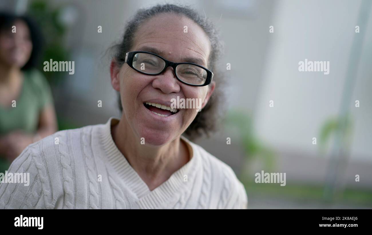 One happy senior woman laughing and smiling. South American hispanic ...