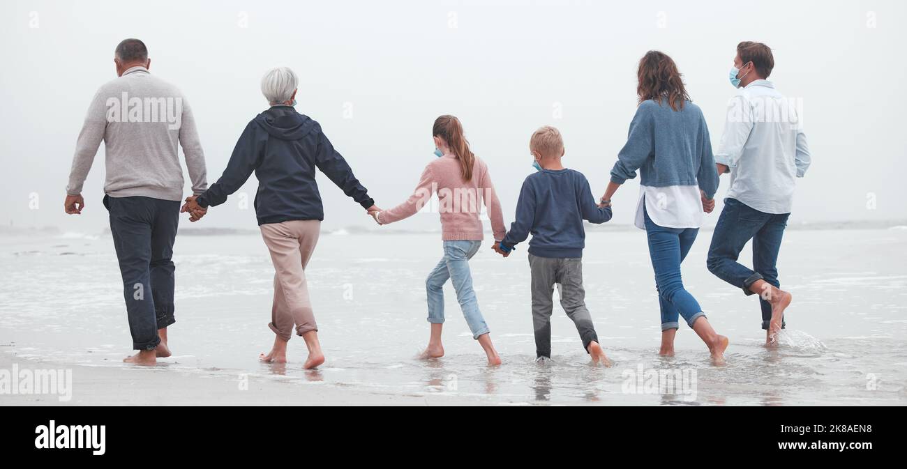 Parents kids holding hands hi-res stock photography and images - Alamy