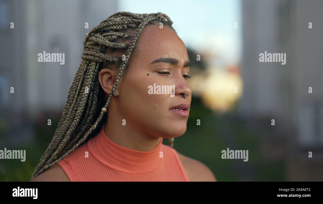 One worried black woman showing concern emotion to friend. A ...