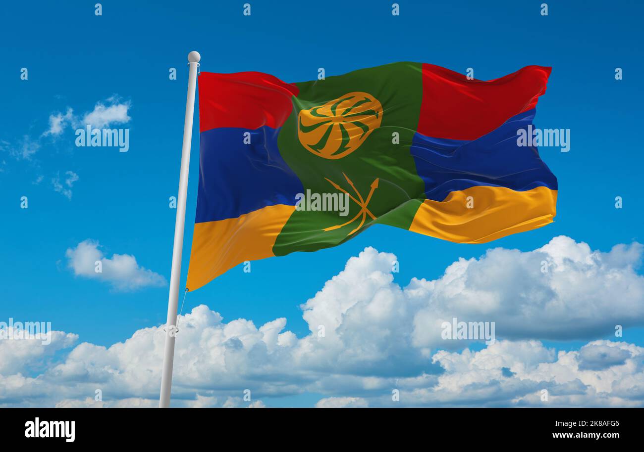 flag of Caucasus Armenian peoples Cherkesogai at cloudy sky background ...