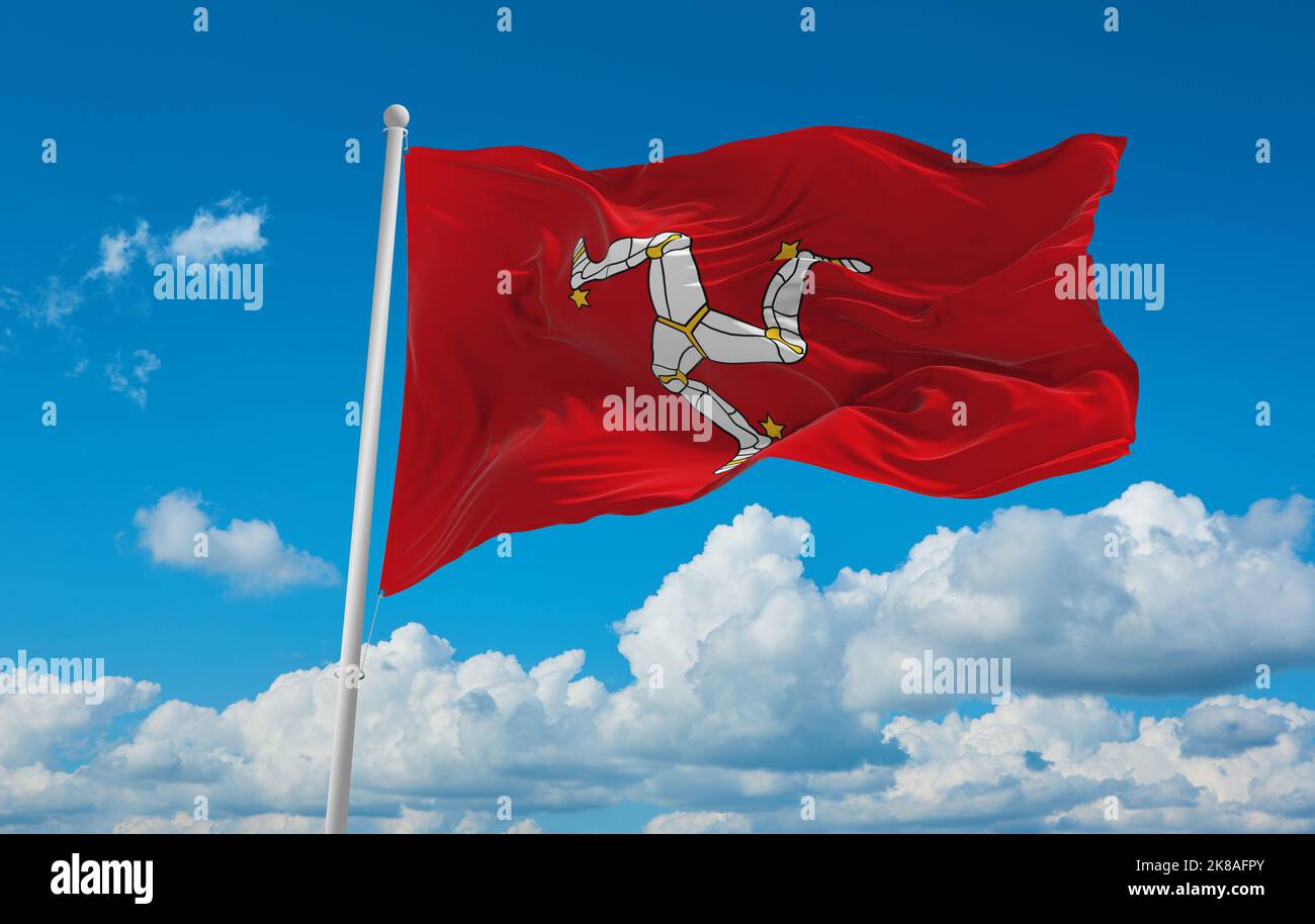 flag of Celtic peoples Manx people at cloudy sky background, panoramic ...