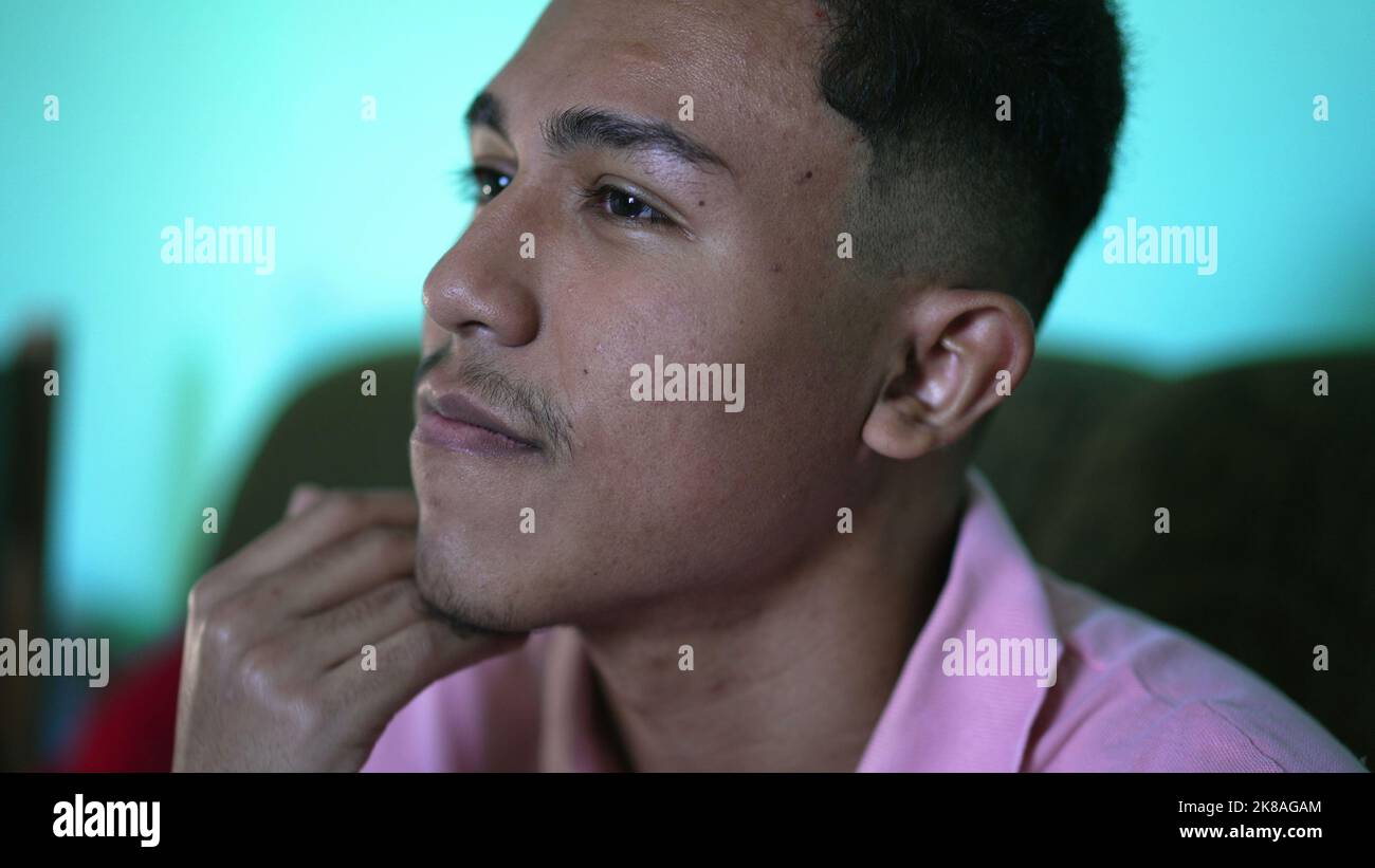 One pensive hispanic guy thinking. A serious thoughtful South American ...