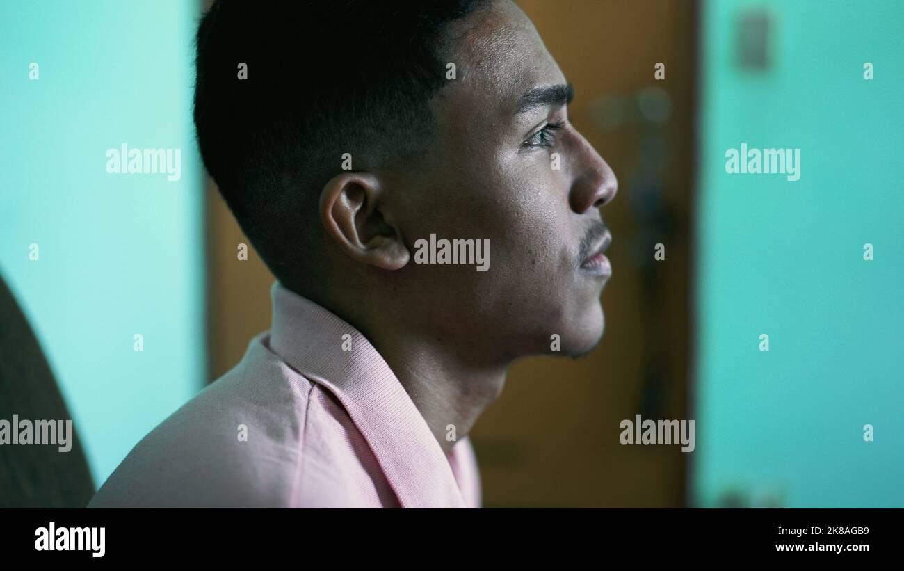 One pensive Brazilian man thinking about life. A thoughtful hispanic ...