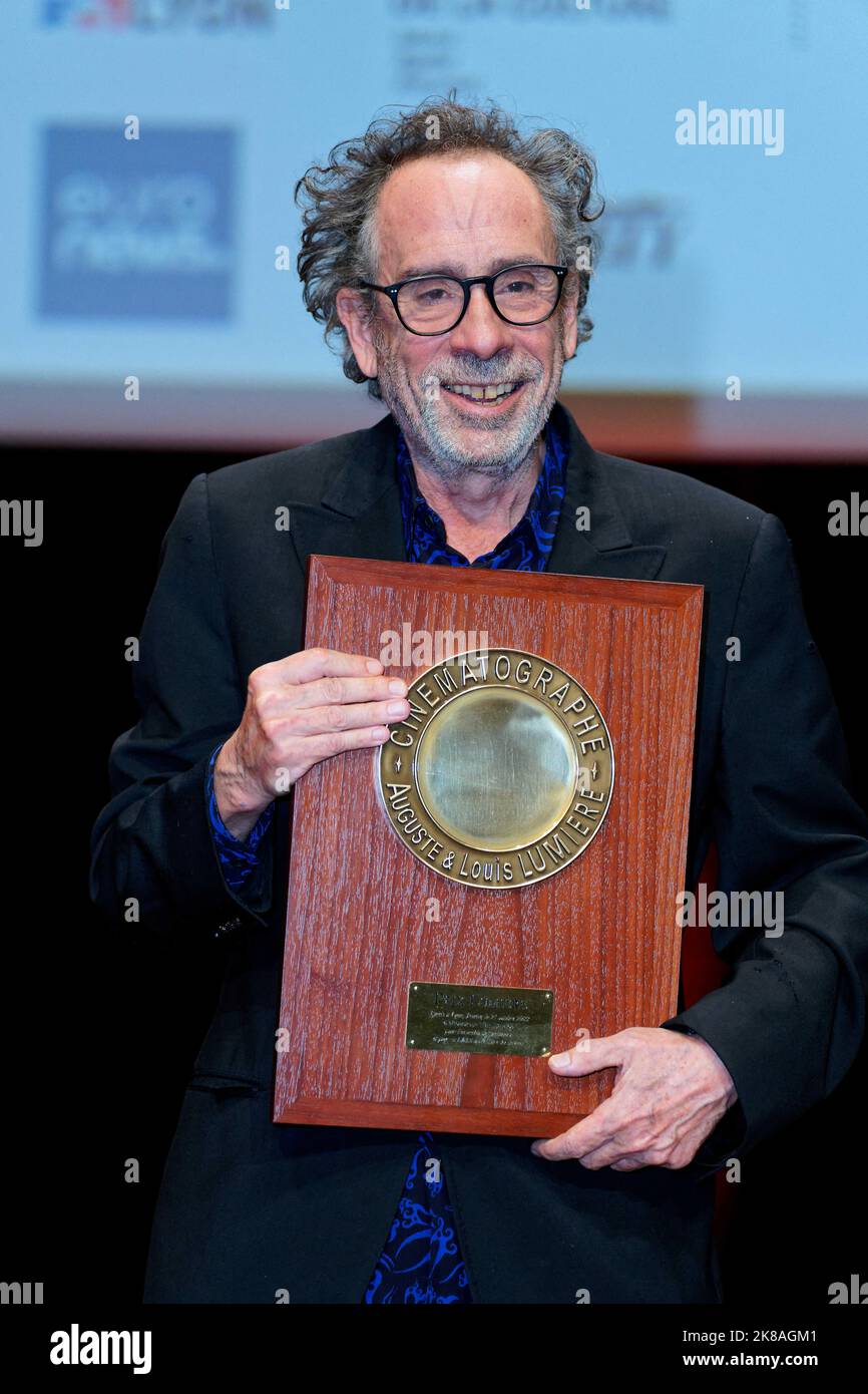 Tim Burton acknowledges the audience onstage the Lumiere Award ceremony ...