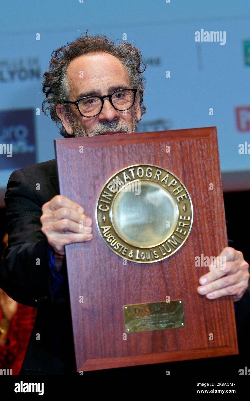 Tim Burton acknowledges the audience onstage the Lumiere Award ceremony ...