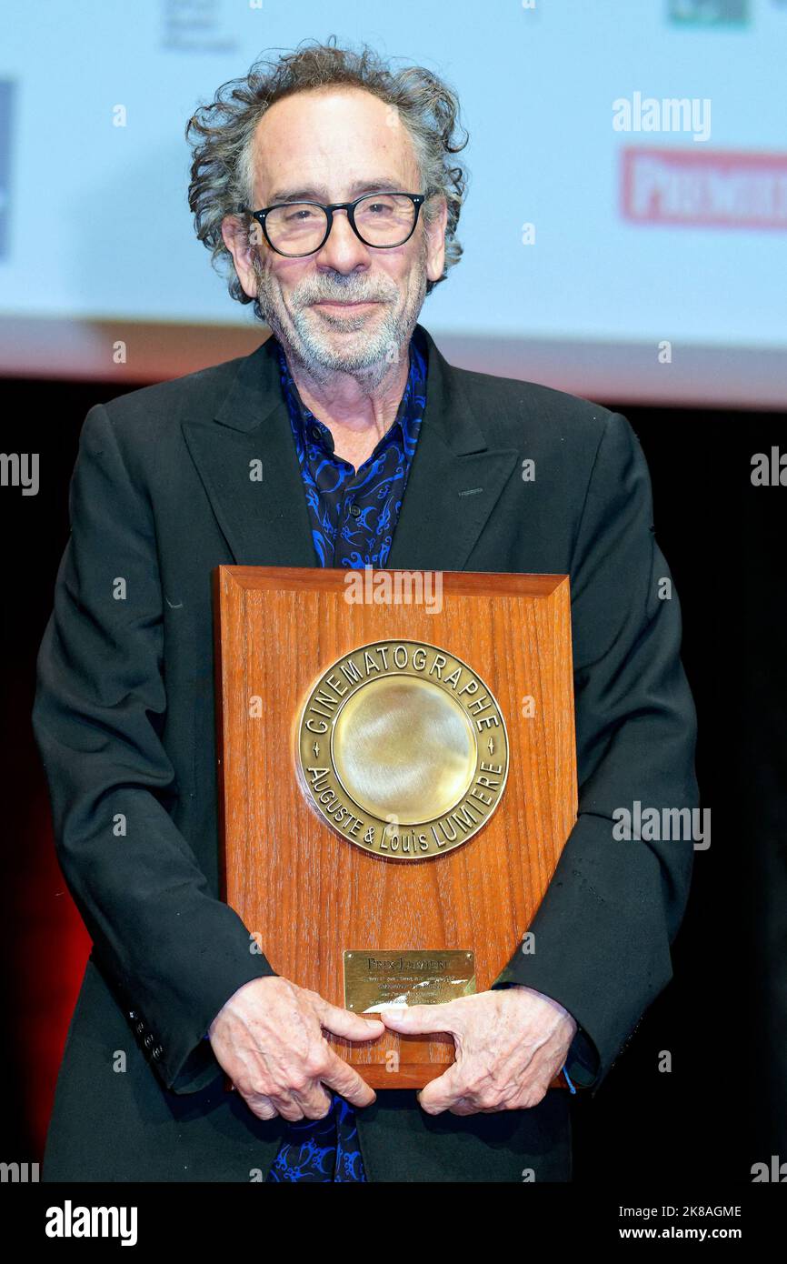 Tim Burton acknowledges the audience onstage the Lumiere Award ceremony ...