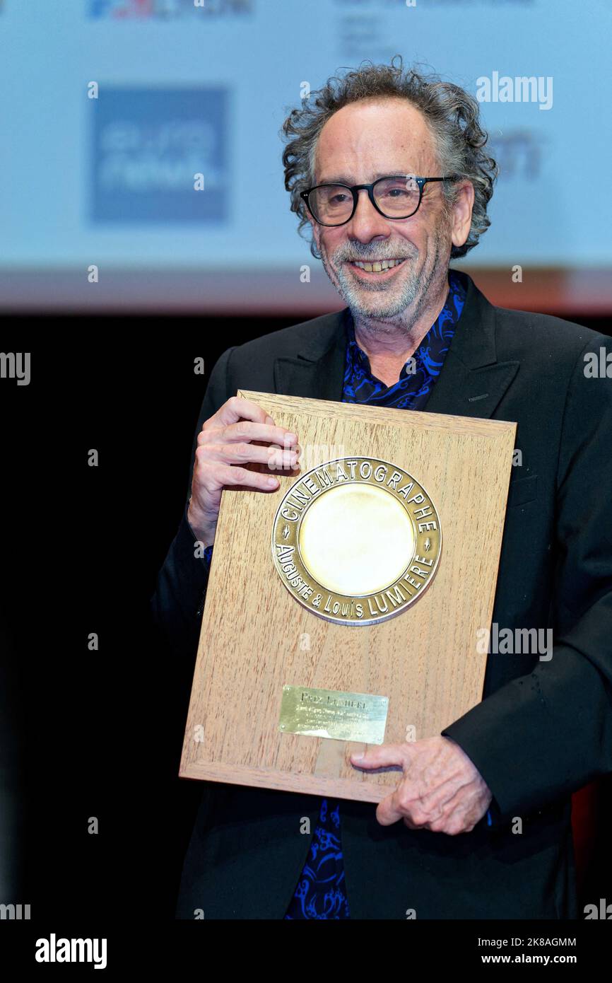 Tim Burton acknowledges the audience onstage the Lumiere Award ceremony ...
