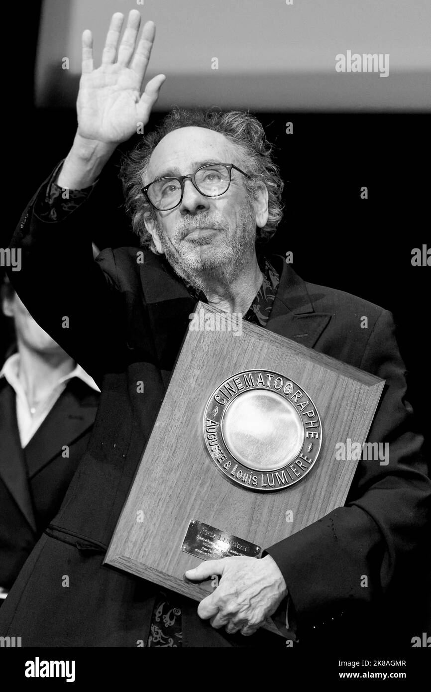 Tim Burton acknowledges the audience onstage the Lumiere Award ceremony ...