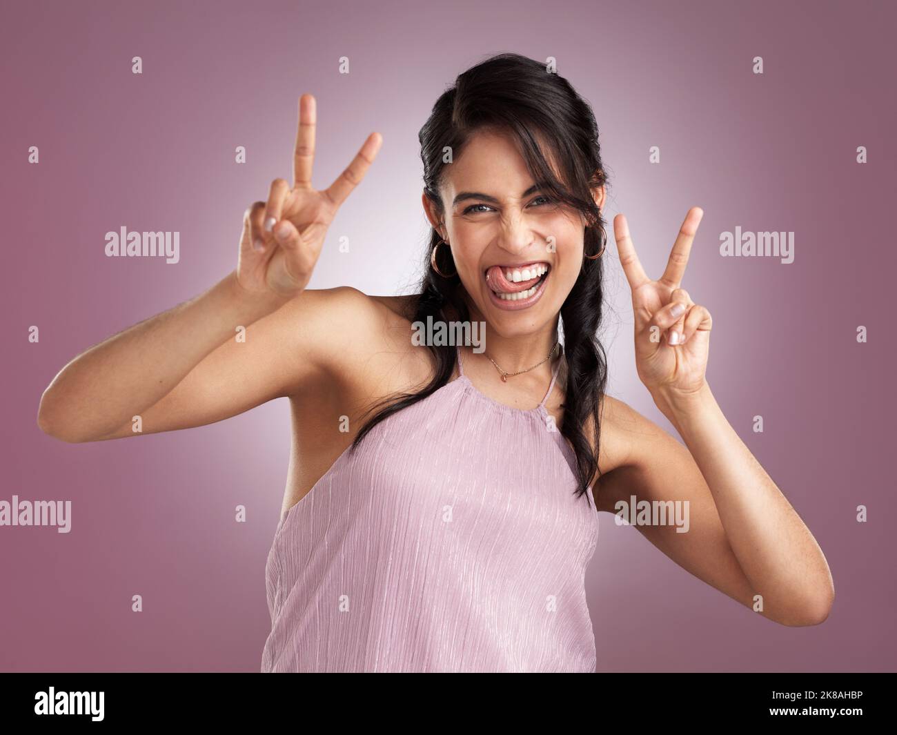 Throw sass around like confetti. a beautiful cheeky young woman showing ...