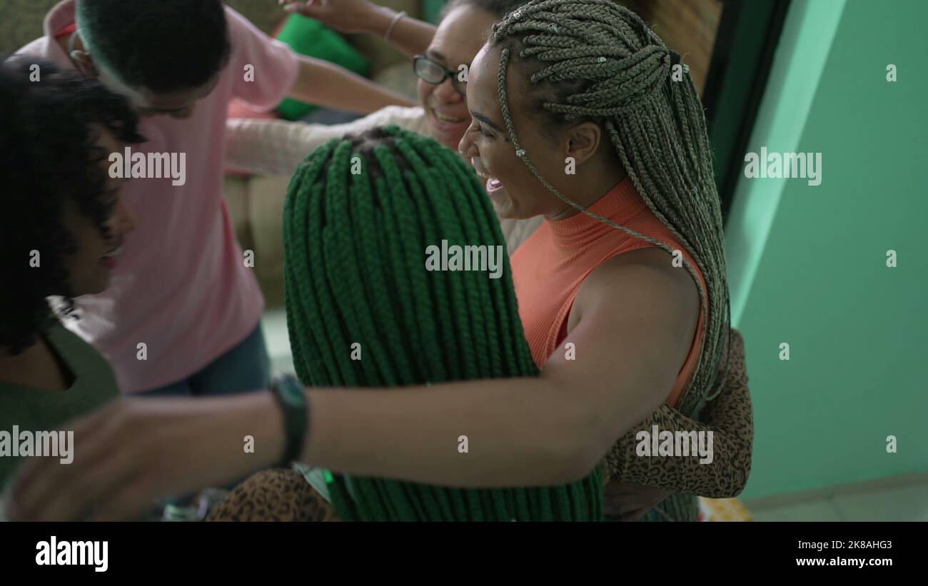 Group hug hispanic family hi-res stock photography and images - Alamy