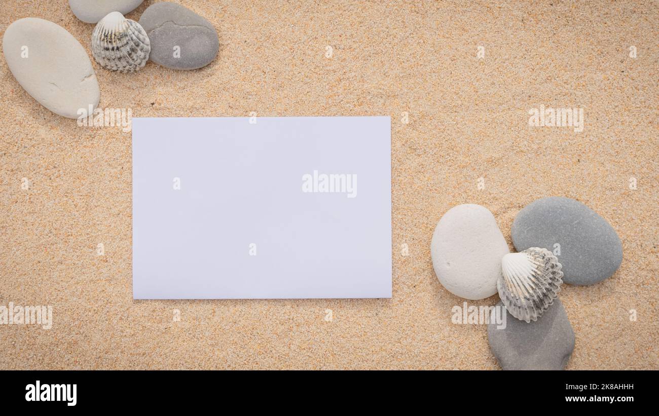 Background grains of sea sand, fine beach sand with envelope and pebble ...
