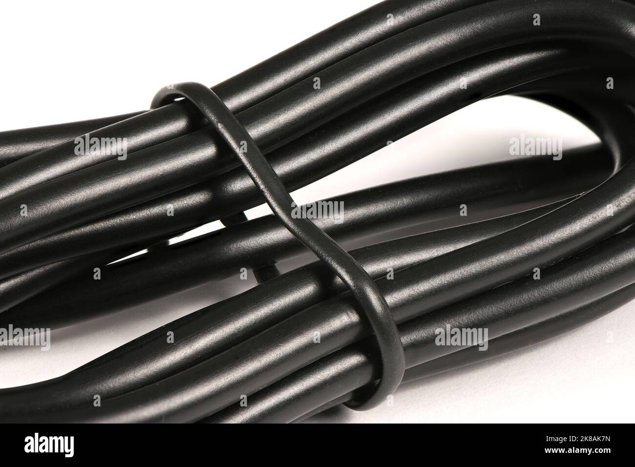 Black power wire isolated on white background. Side view. High ...