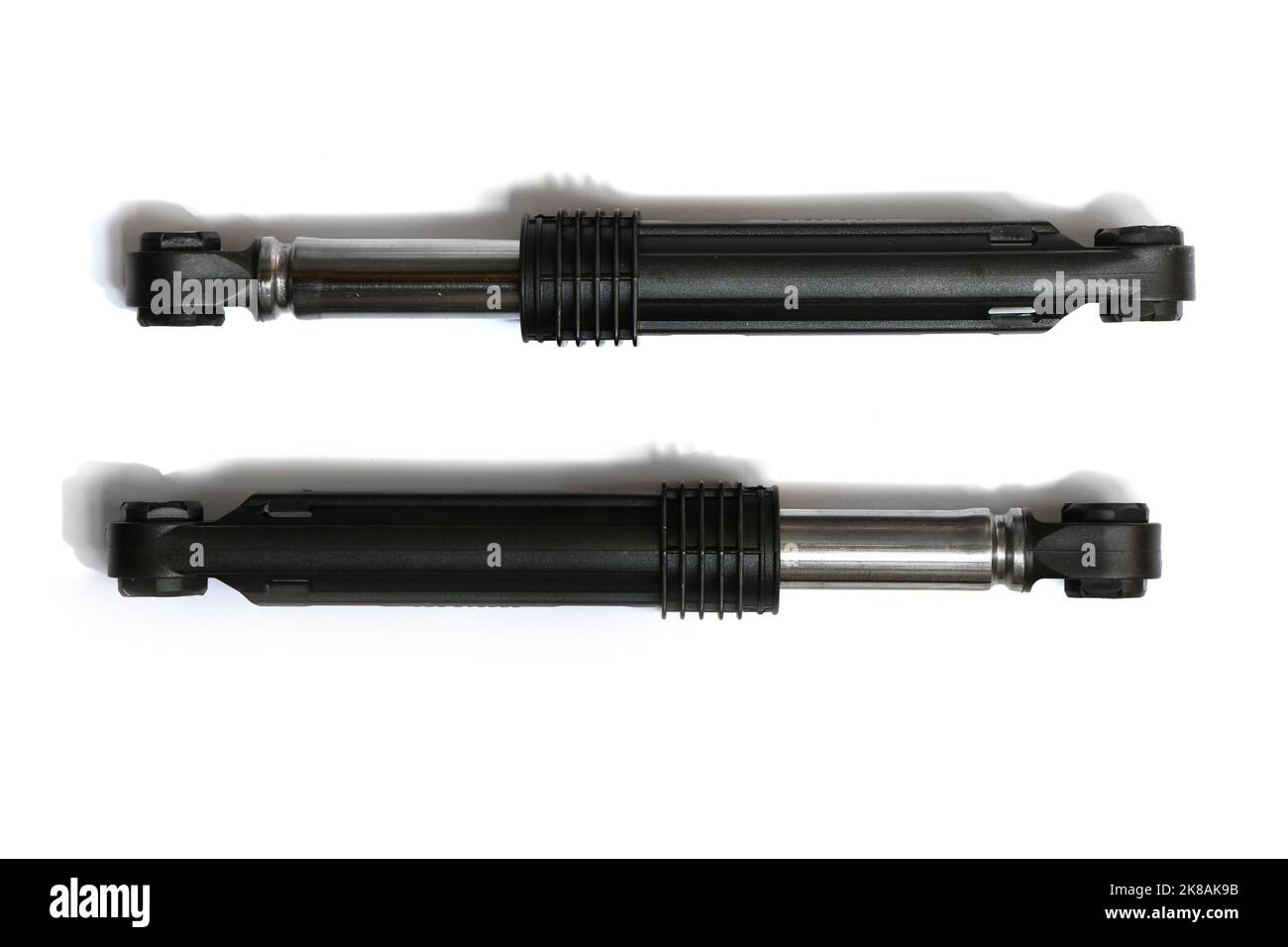 Washing machine shock absorbers on white. High resolution photo. Full ...