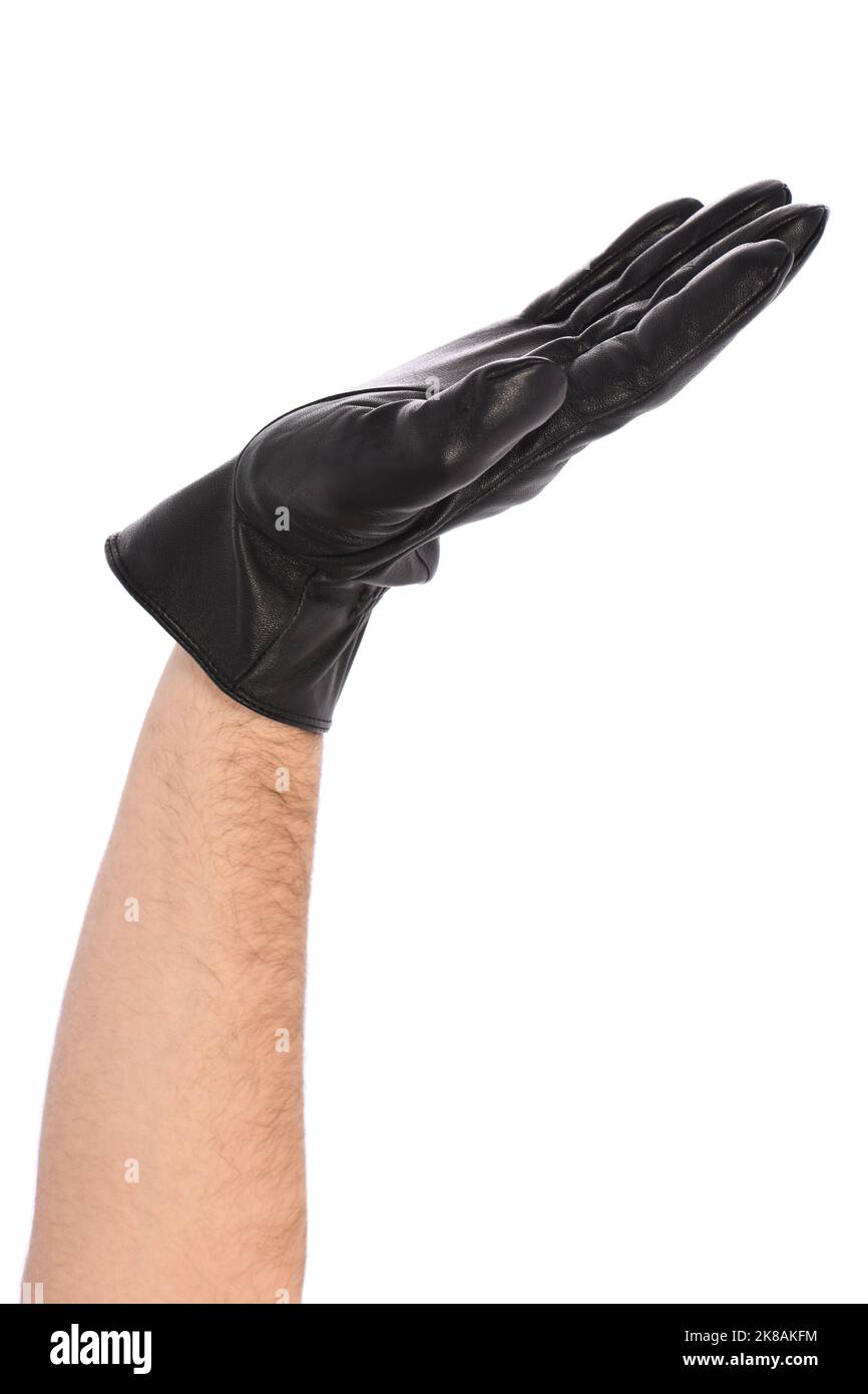 Man wearing black leather glove on white background, closeup. Side view ...