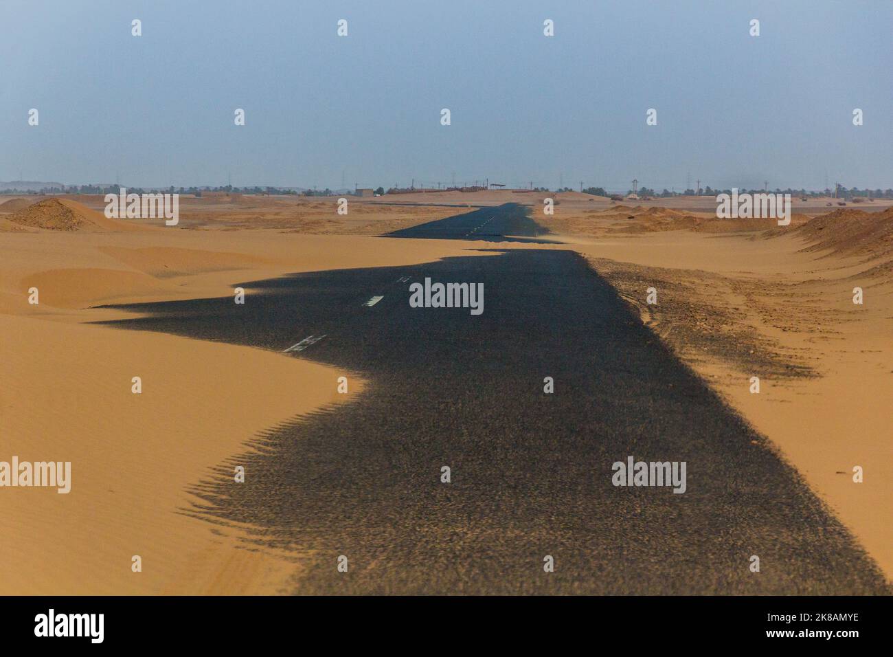 Paved road covered in a sand near Karima, Sudan Stock Photo - Alamy