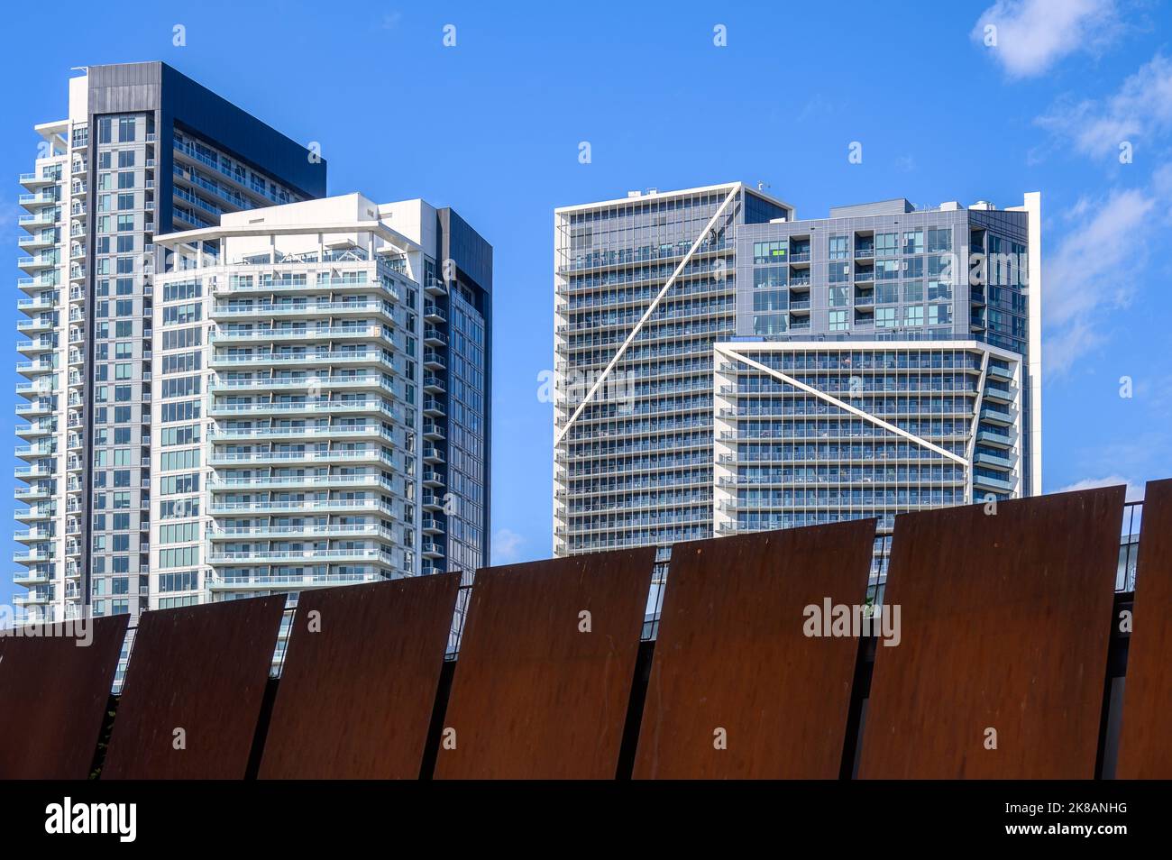 Modern skyscraper buildings framed in the metallic cover of the Fort ...
