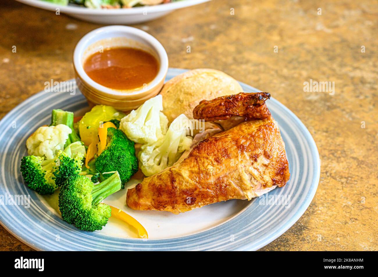 A standard chicken meal at a Swiss Chalet restaurant Stock Photo - Alamy