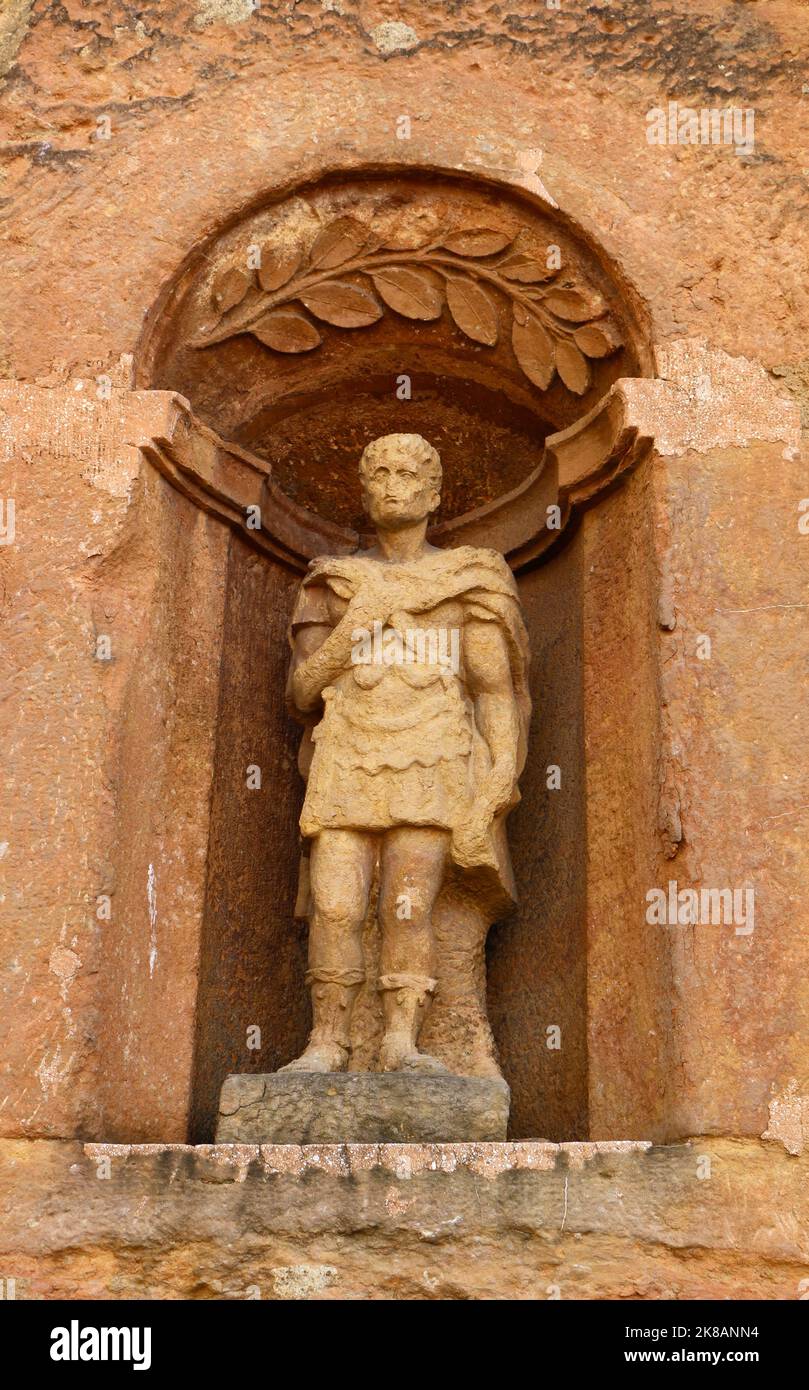 Small stone sculpture of a Roman man in a wall alcove Iglesia de San ...