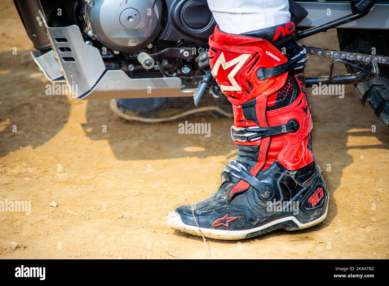 Armored riding boots covering ankle and shins with colorful design on ...