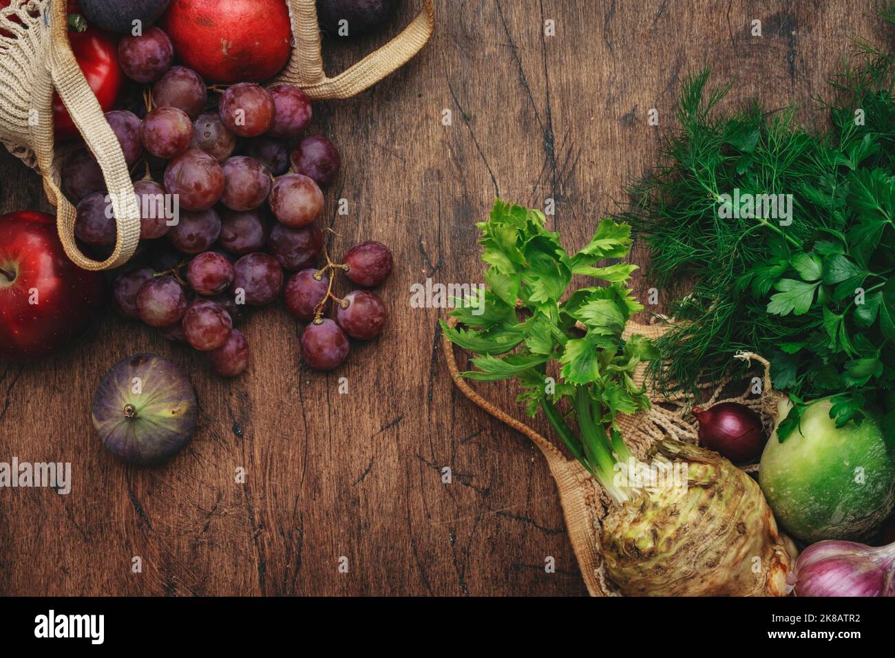 Autumn food background with vegetables, root crops and fruits in string ...
