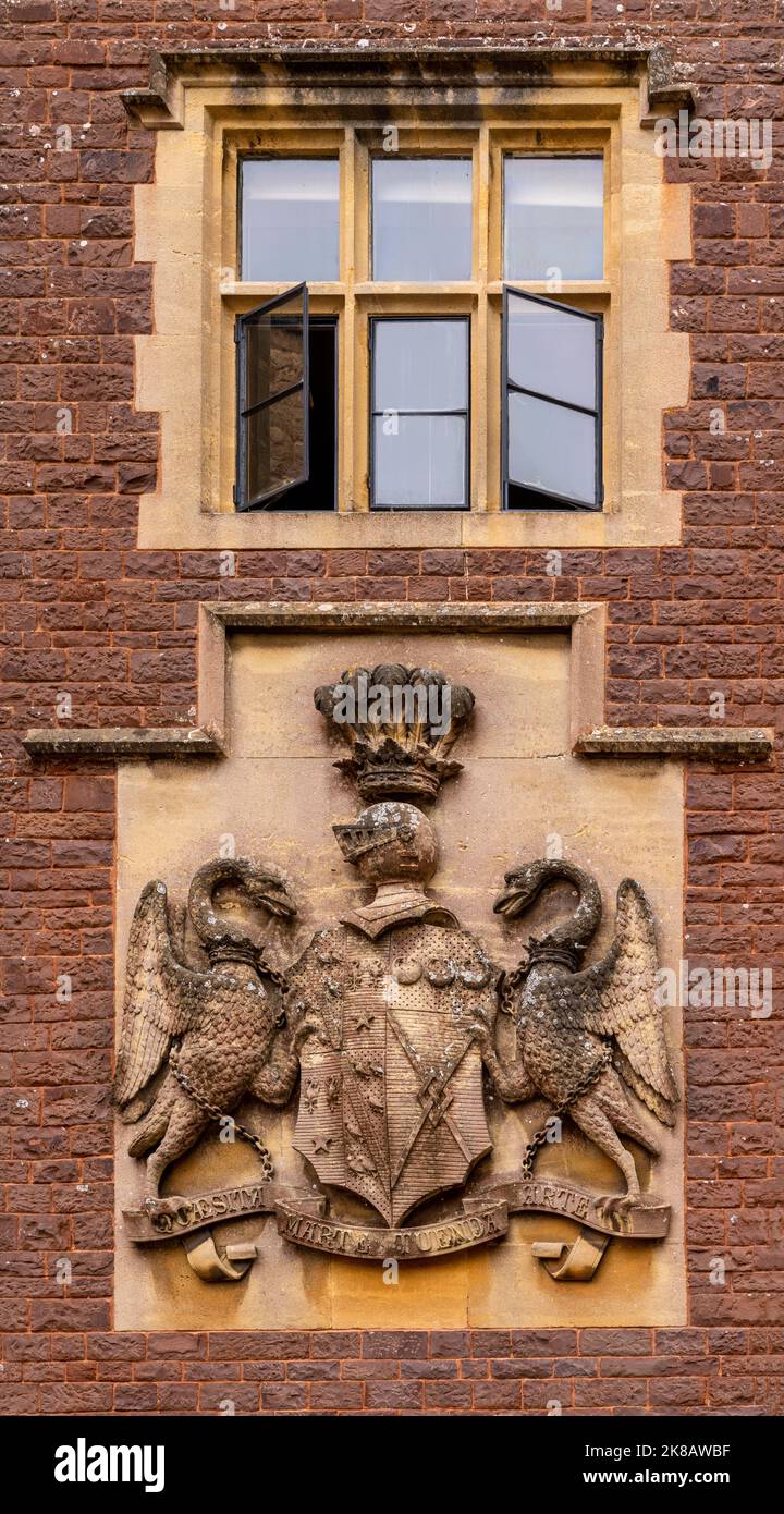 Coat of arms on the front of Dunster Castle, Dunster, Somerset, England ...