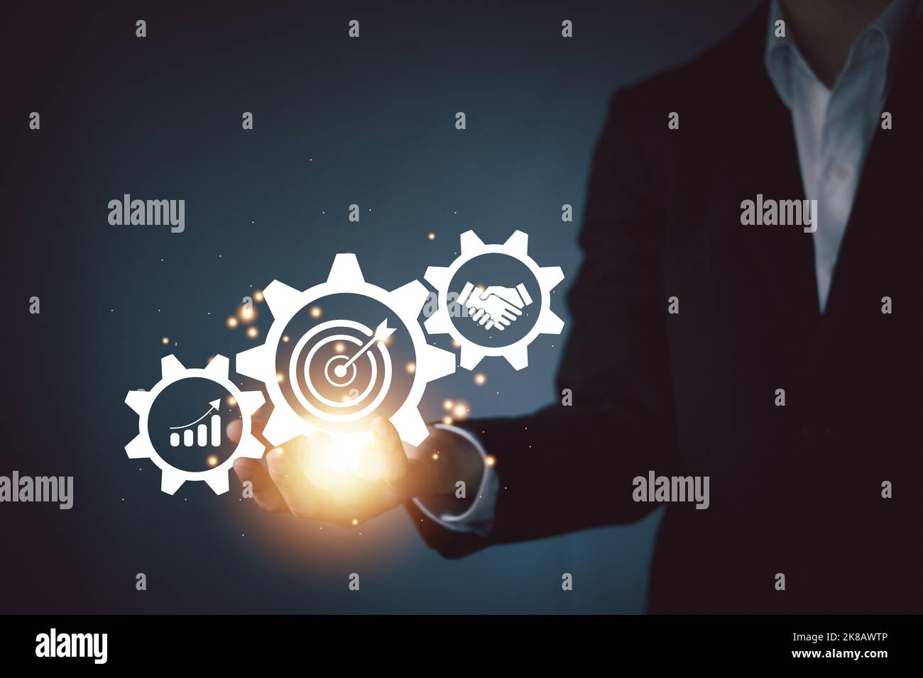 Gears on hand of Businessman. Successful business and process ...