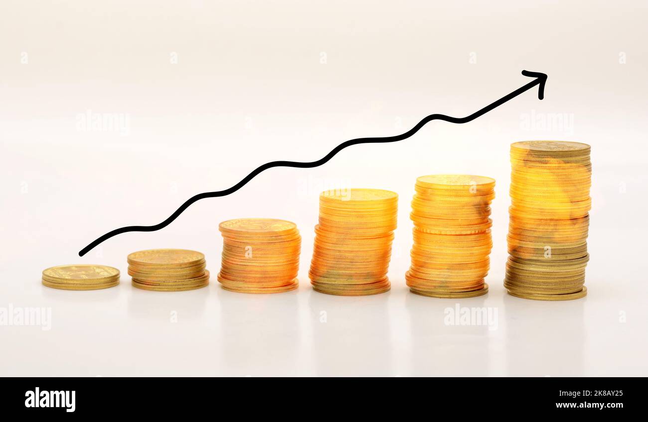 Concept of inflation with fire on coins and trend going upwards Stock ...