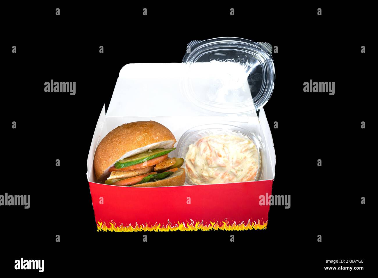 Fried chicken burger in a cartoon meal box on a black background Stock ...