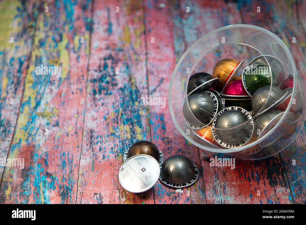 Nespresso Coffee Pods On Colorful Wooden Background Stock Photo - Alamy
