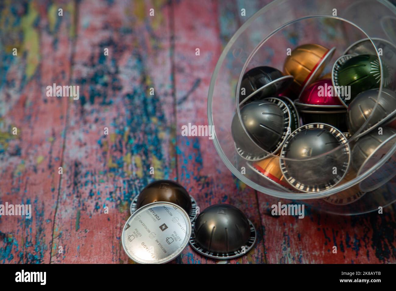 Nespresso Coffee Pods On Colorful Wooden Background Stock Photo - Alamy