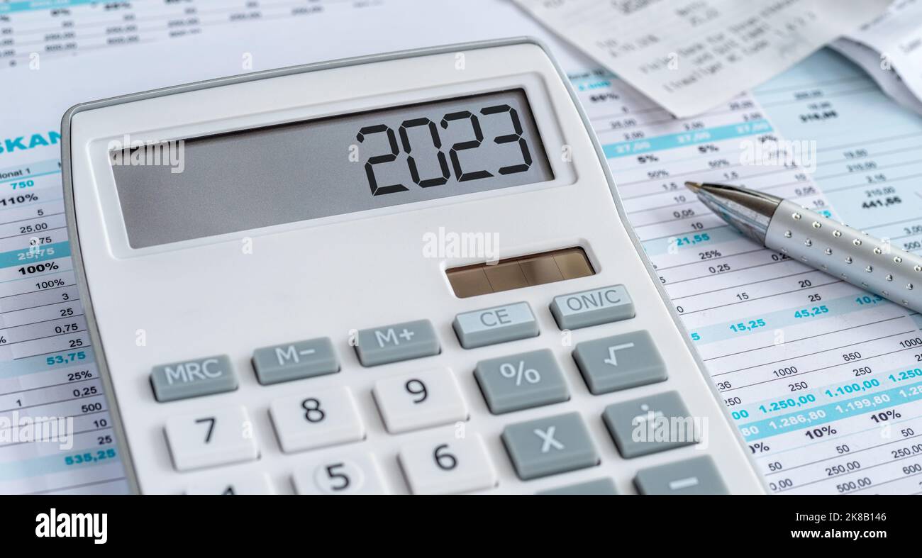 A calculator with the 2023 on the display Stock Photo - Alamy
