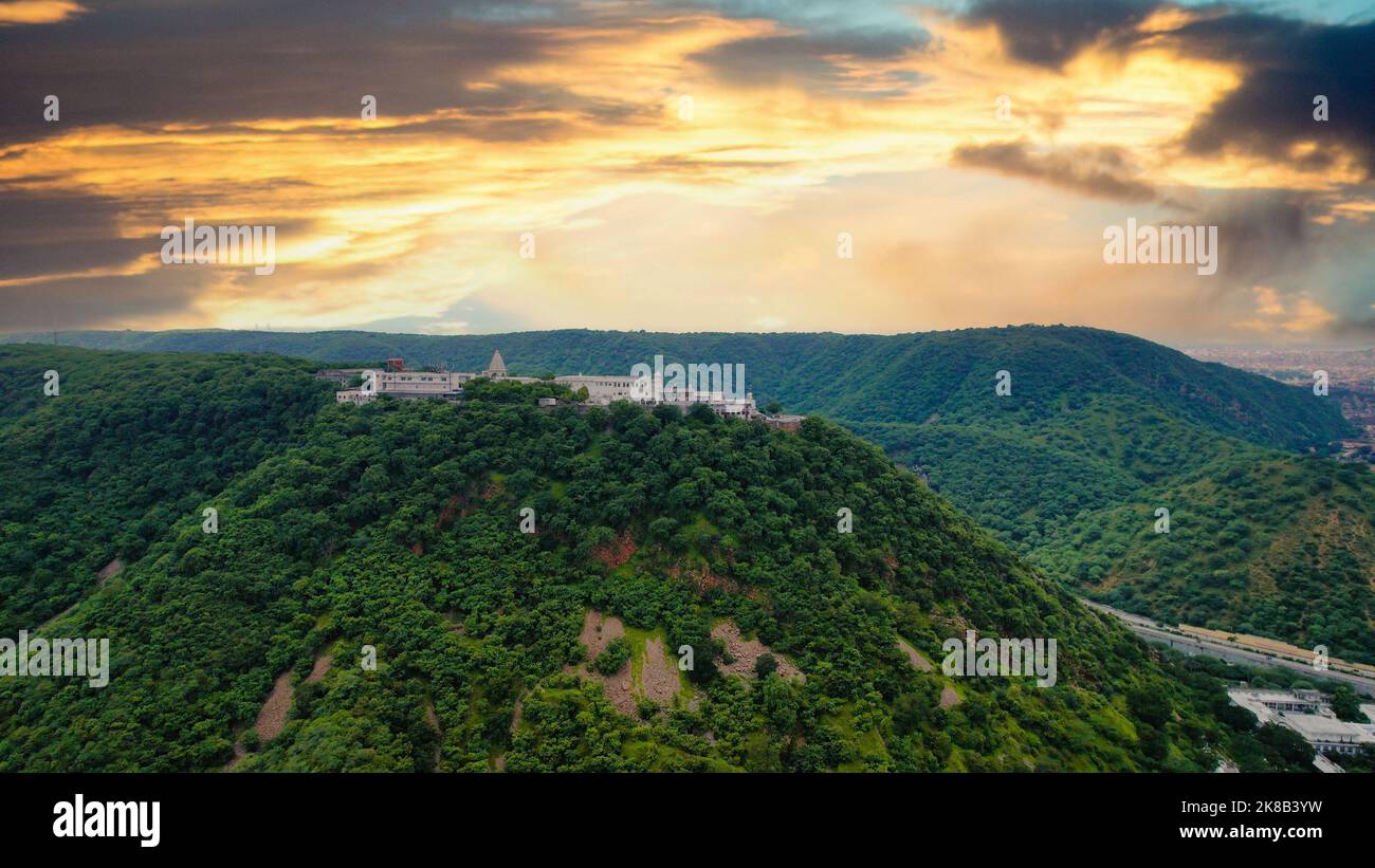 aerial drone shot flying towards the famous landmark chulgiri jain ...