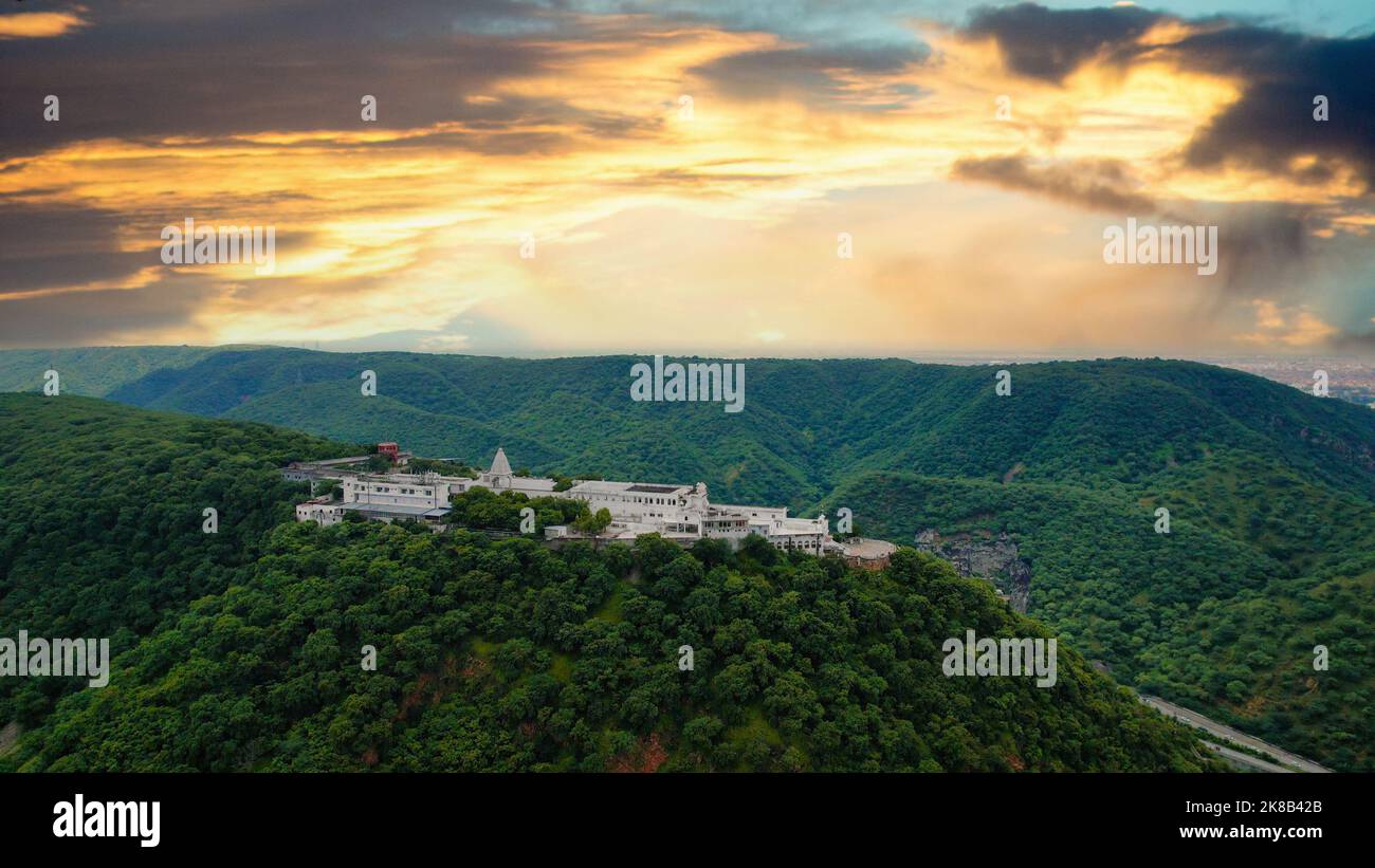aerial drone shot flying towards the famous landmark chulgiri jain ...