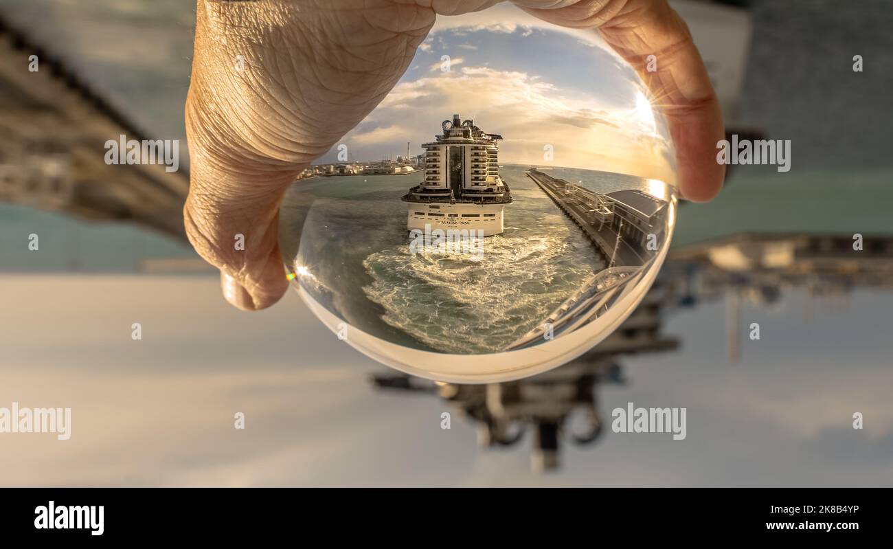 Cruise ship sailing in a crystal ball Stock Photo - Alamy