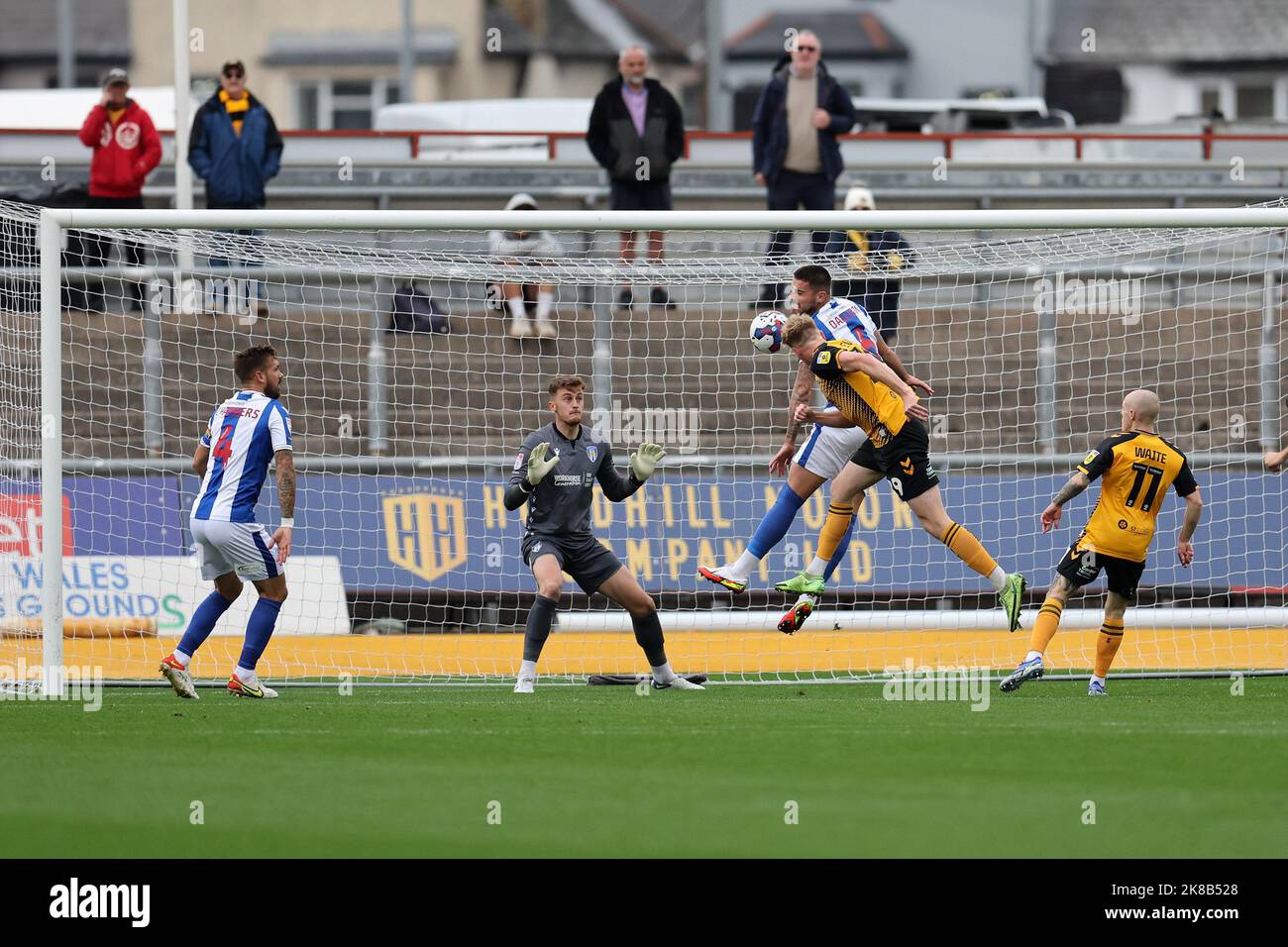 Newport, UK. 22nd Oct, 2022. Will Evans of Newport county heads and ...