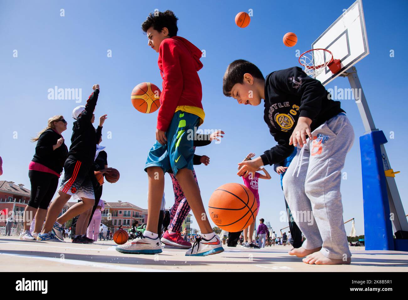 Doha ,Qatar-February 14,2016 : Local people enjoy basketball at an ...