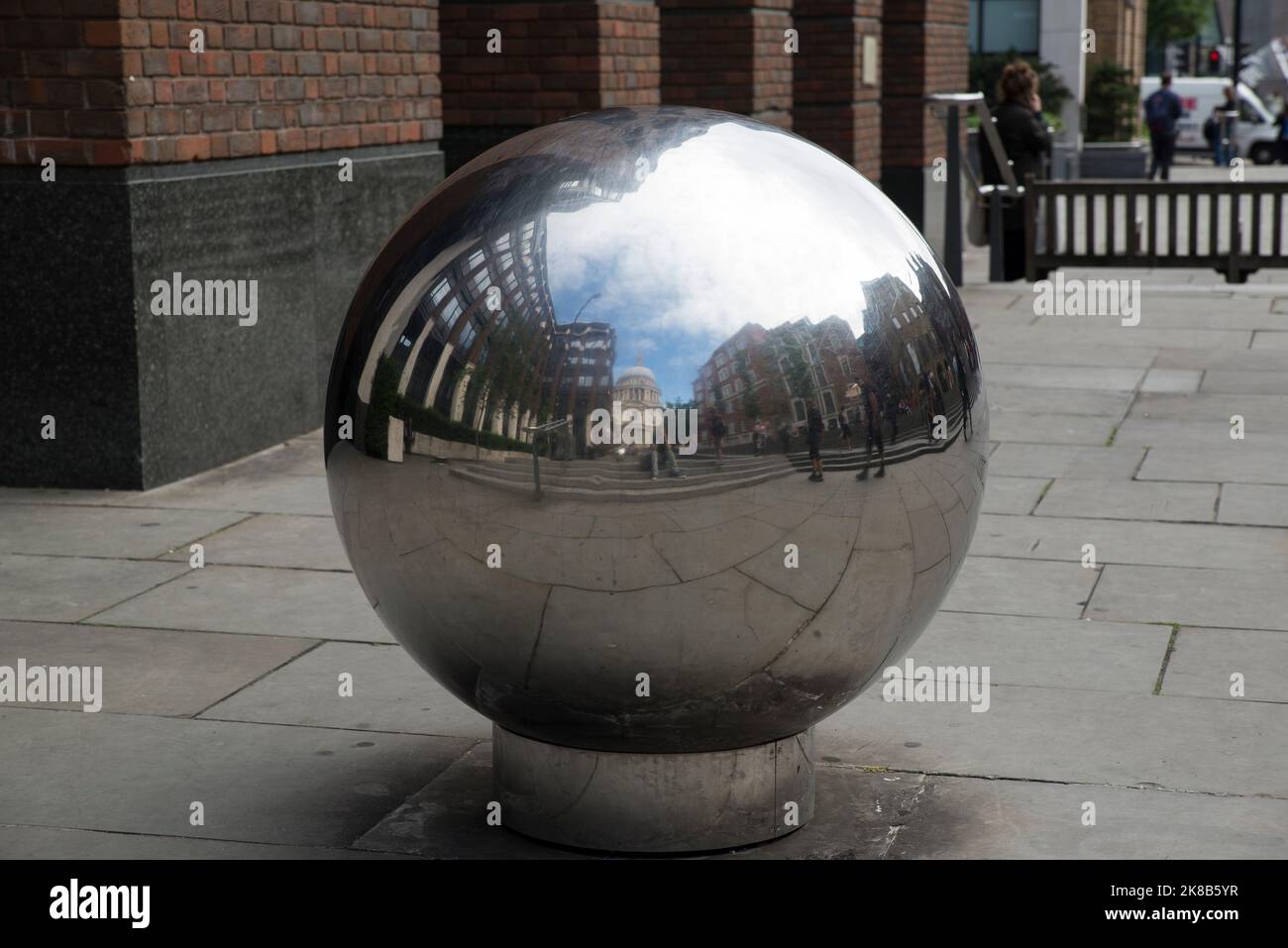 St Pauls Cathedral reflected in large steel ball Stock Photo - Alamy
