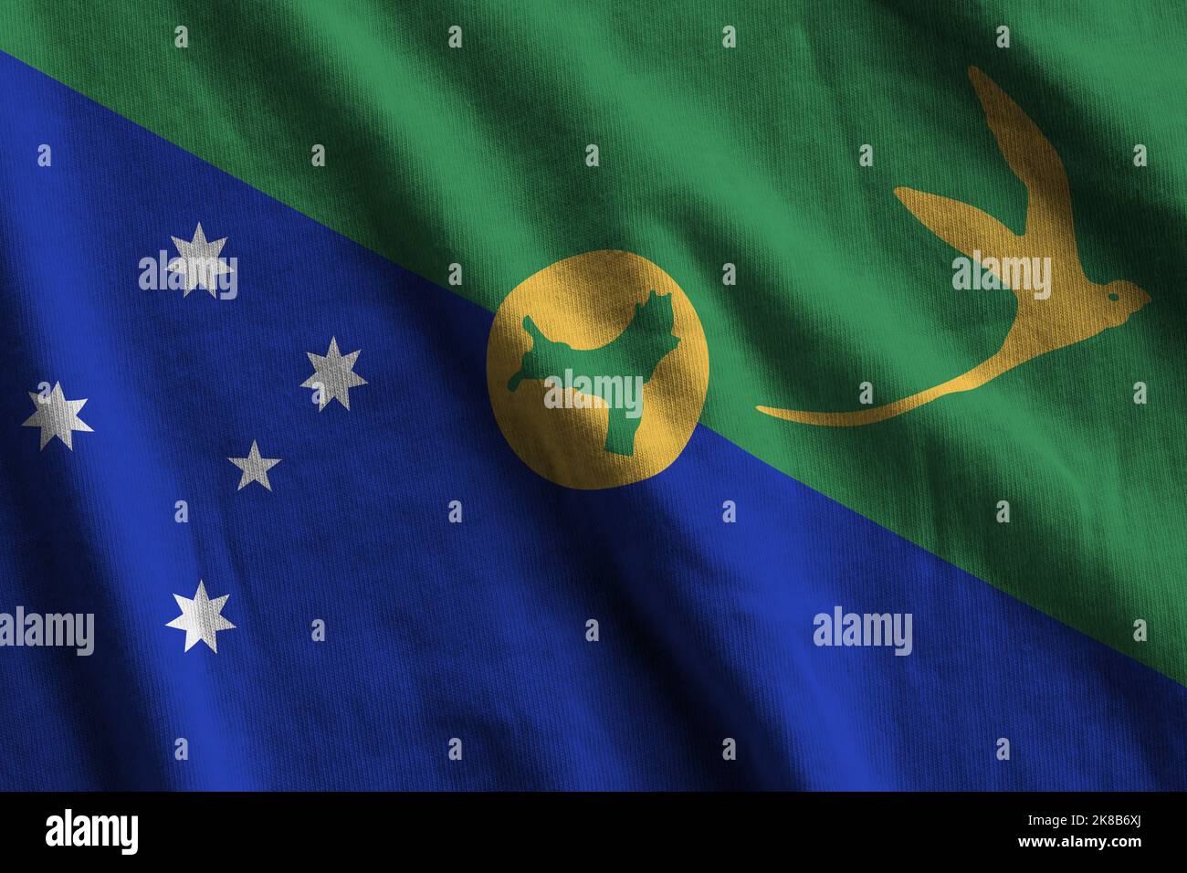 Christmas island flag with big folds waving close up under the studio ...