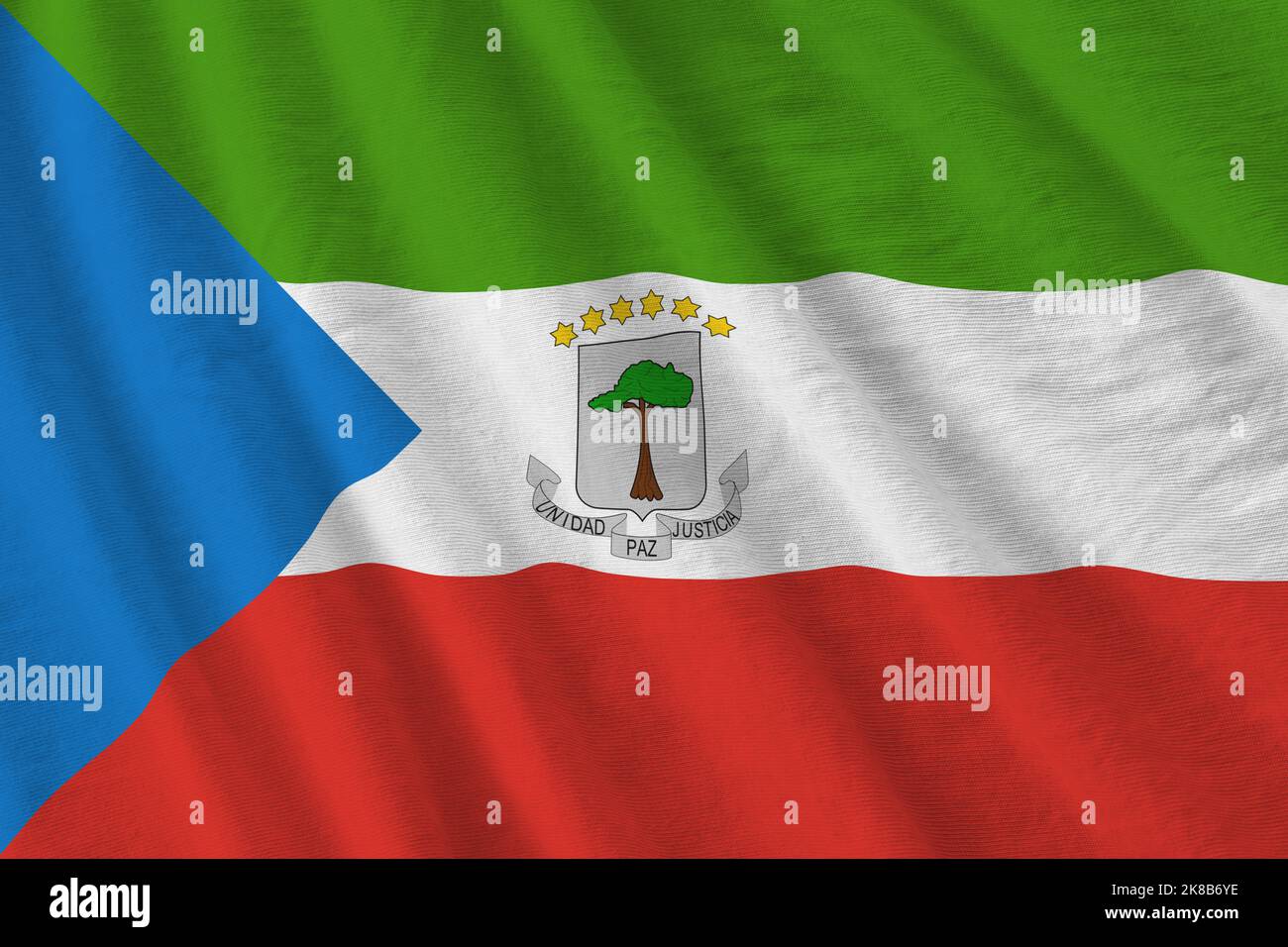 Equatorial Guinea flag with big folds waving close up under the studio ...