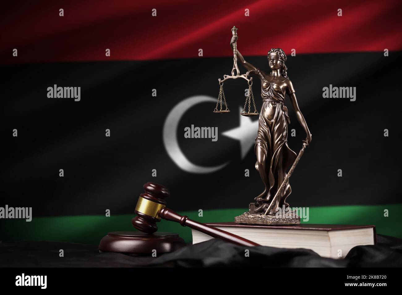 Libya flag with statue of lady justice hi-res stock photography and ...
