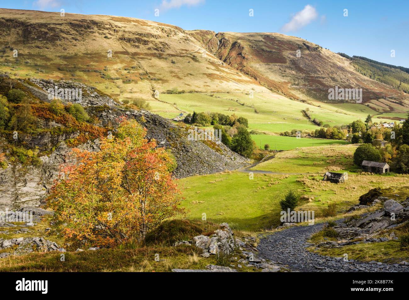 Slate trail through disused Rhiw Fachno quarry above village in valley ...