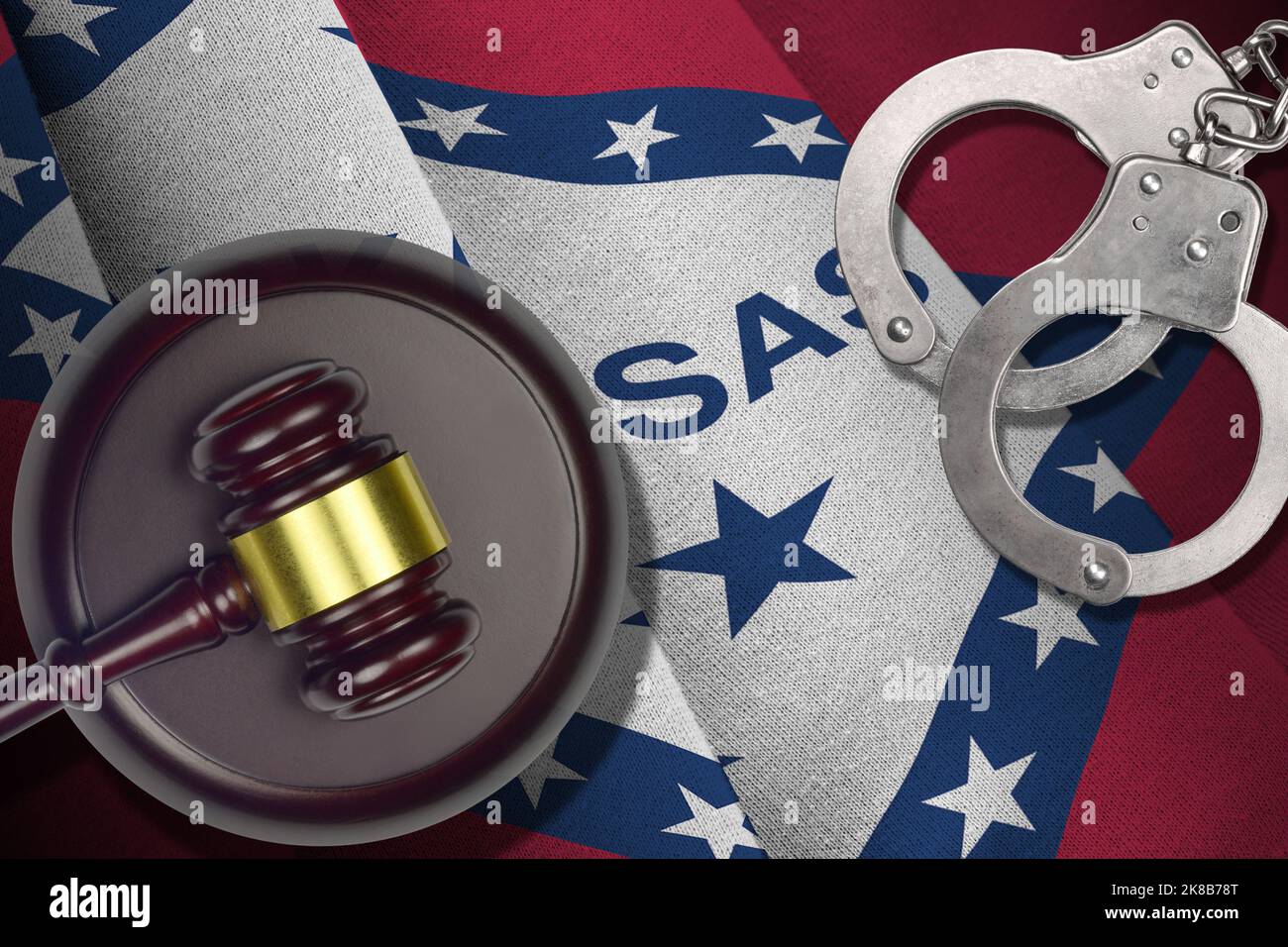 Arkansas US state flag with judge mallet and handcuffs in dark room ...
