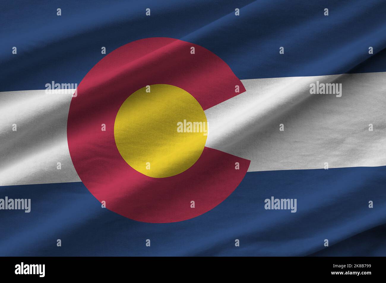 Colorado US state flag with big folds waving close up under the studio ...