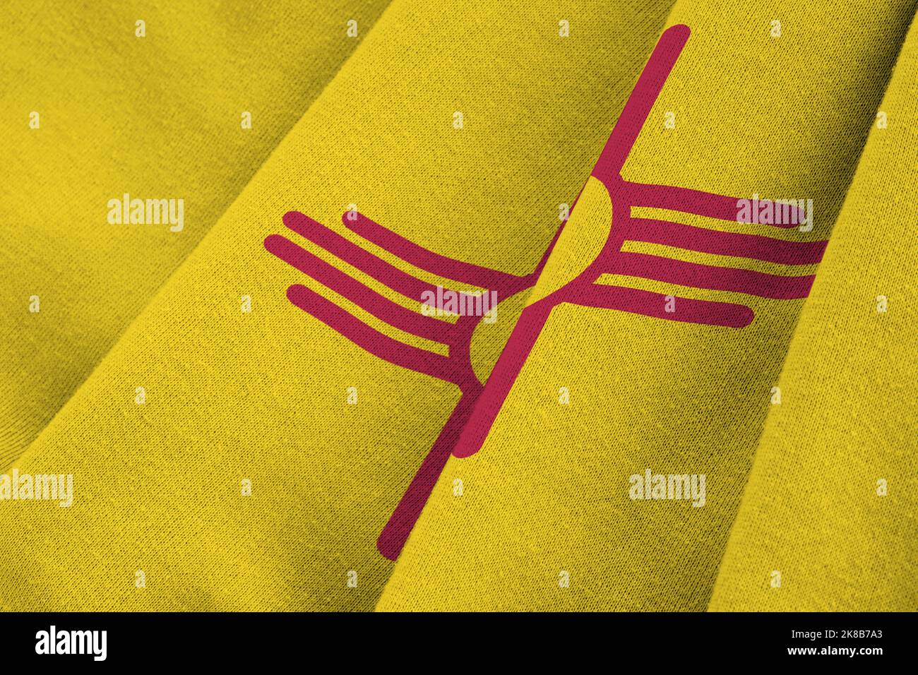 New Mexico US state flag with big folds waving close up under the ...