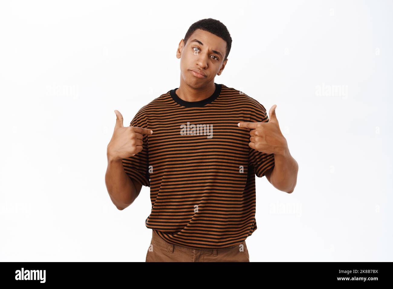 African american man pointing at himself, standing in casual clothes ...