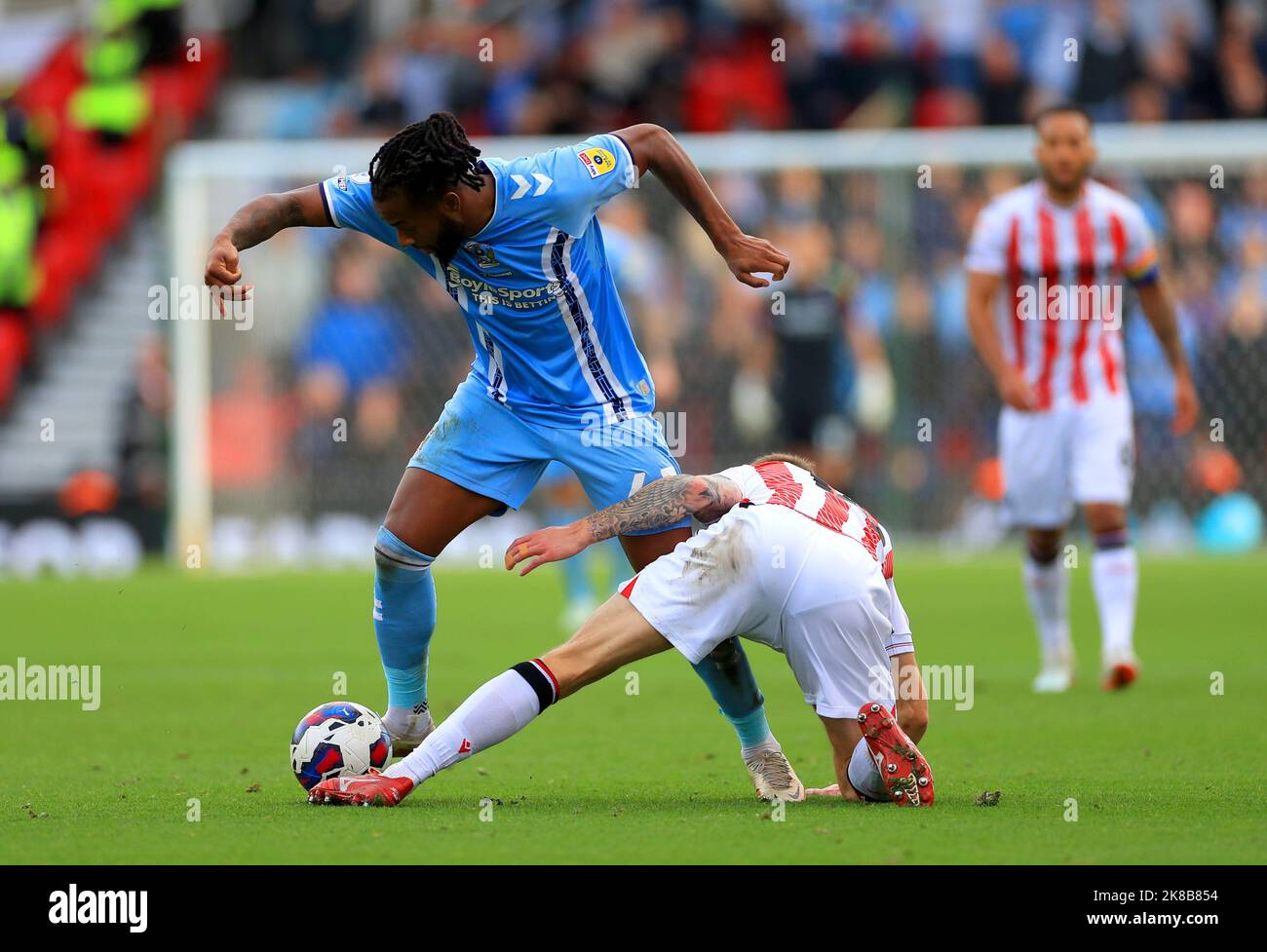 Coventry City's Kasey Palmer (left) and Stoke City's Ben Wilmot battle ...