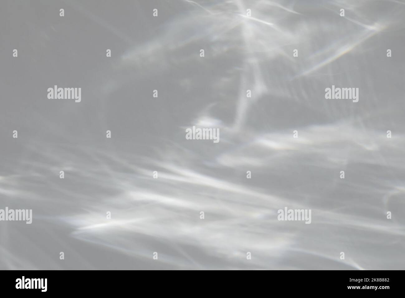 shadow and light caustic effect on a white wall Stock Photo - Alamy