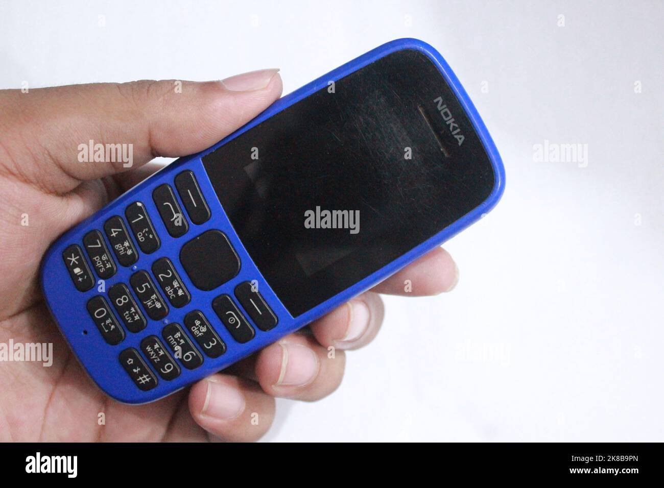 old mobile phone on Hand Stock Photo - Alamy